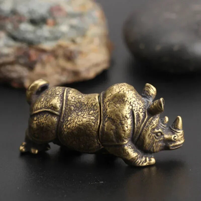 Мини-фигурки носорогов из меди