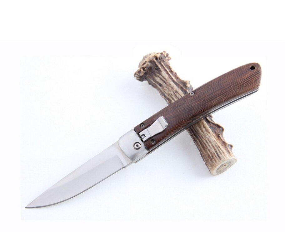 Нож выкидной Лев