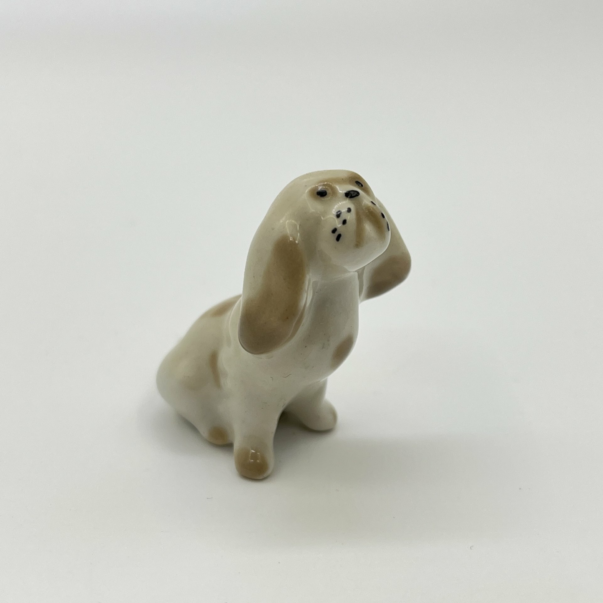 Статуэтка миниатюрная "Болонка", скульптор Н. Е. Муратов, фарфор