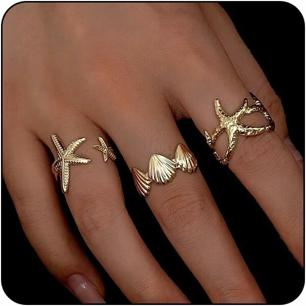 Набор из трех золотых колец FloralGrace с узором в виде морских звезд и изящных волнообразных мотивов из ракушек, идеально подходящий для летнего украшения женщин и девушек.