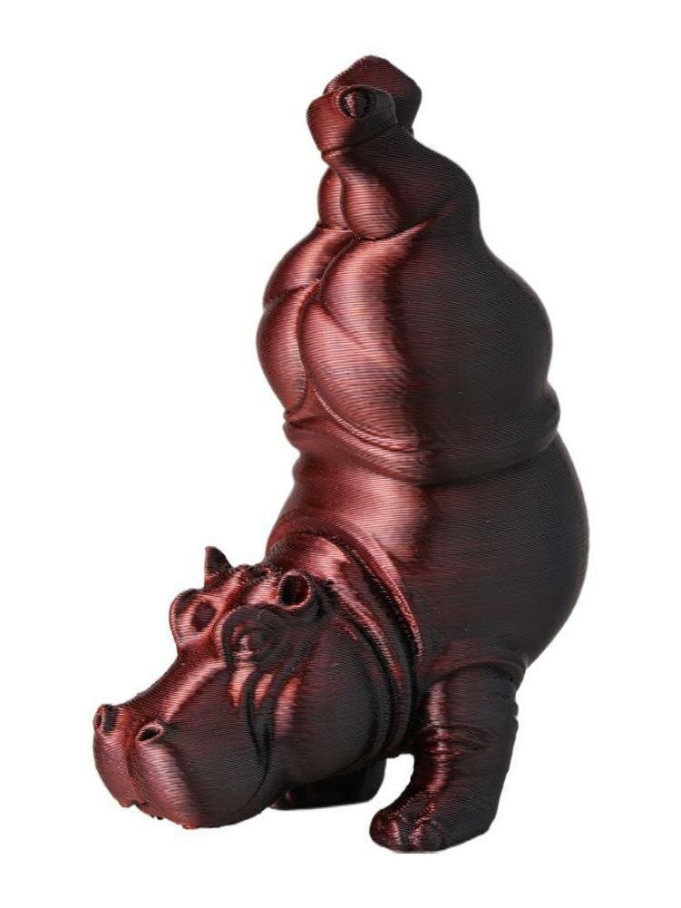 Симпатичная декоративная статуэтка бегемота