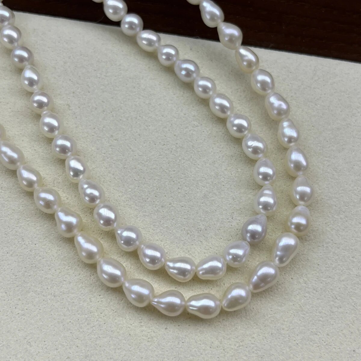 Натуральный пресноводный жемчуг 6-7 мм, каплевидные бусины