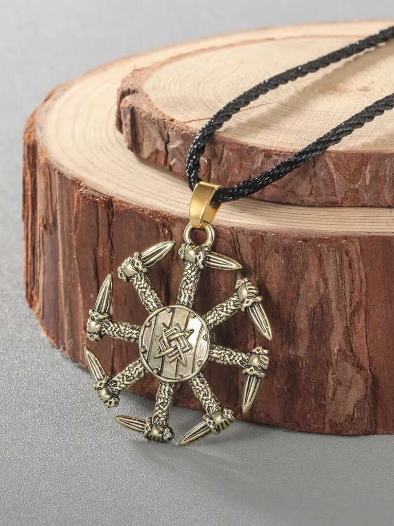 Амулет талисман Славянский Коловрат на верёвке, золотистого цвета.