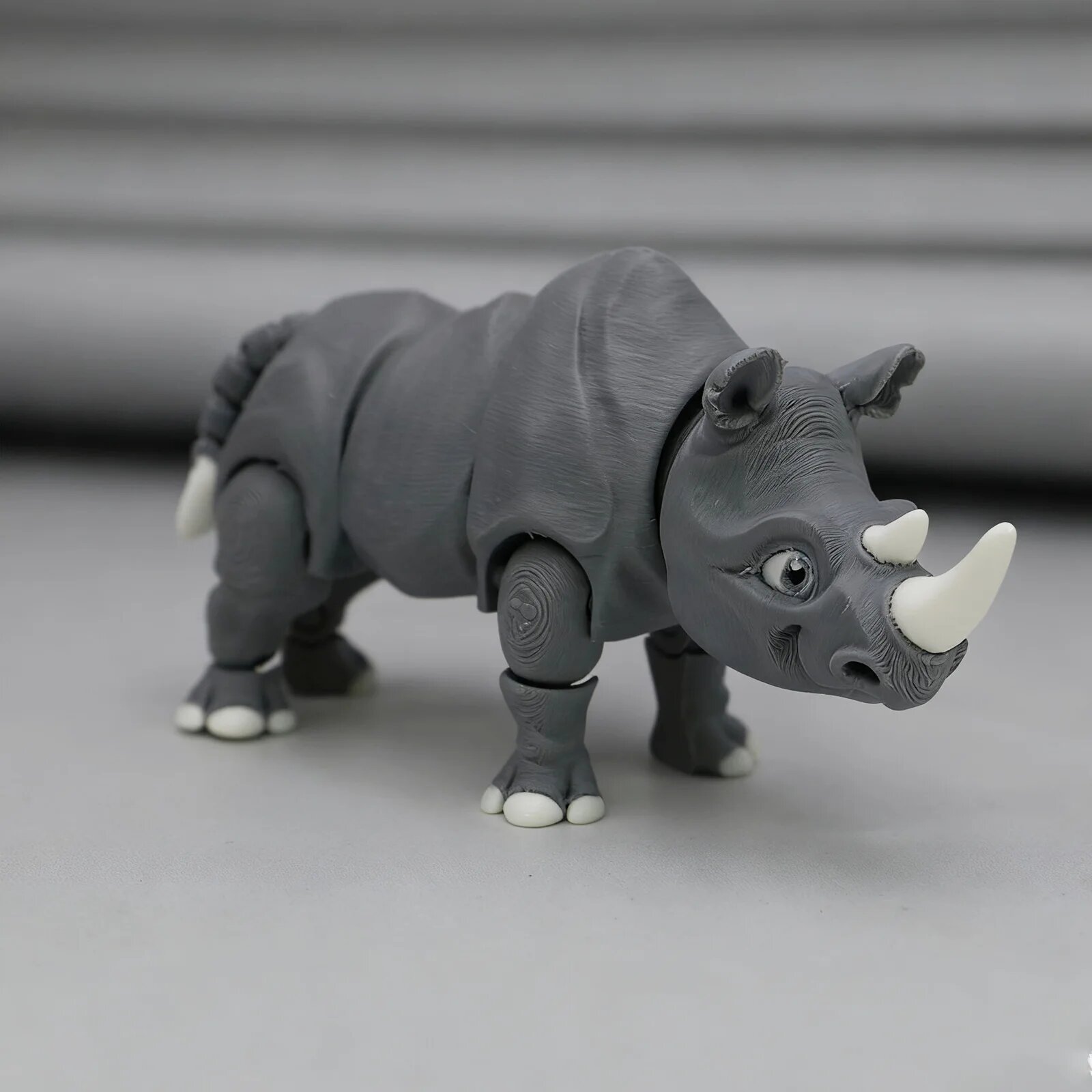 Игрушечный носорог из растительного волокна