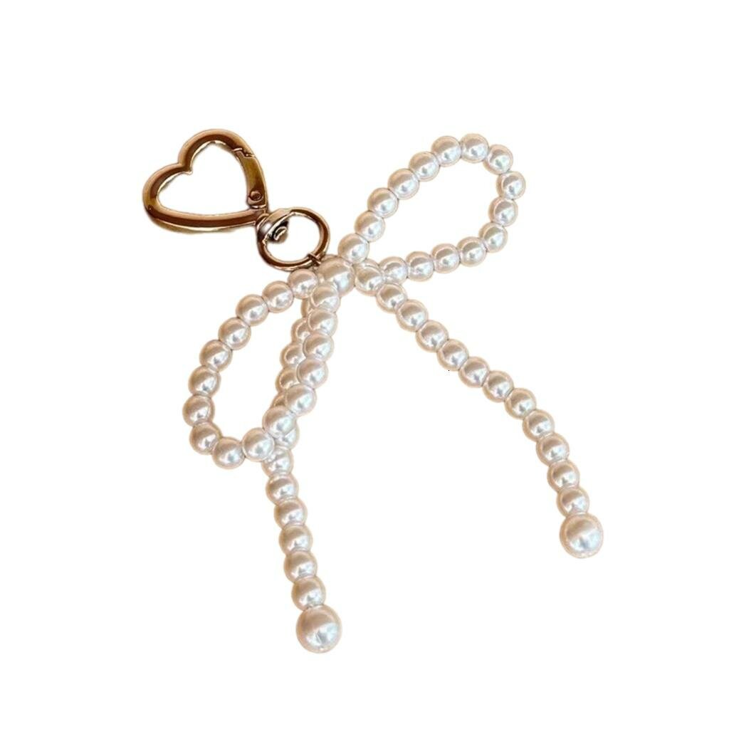 Сердцевидный кулон-ключка с бантами и жемчугом, Серебро