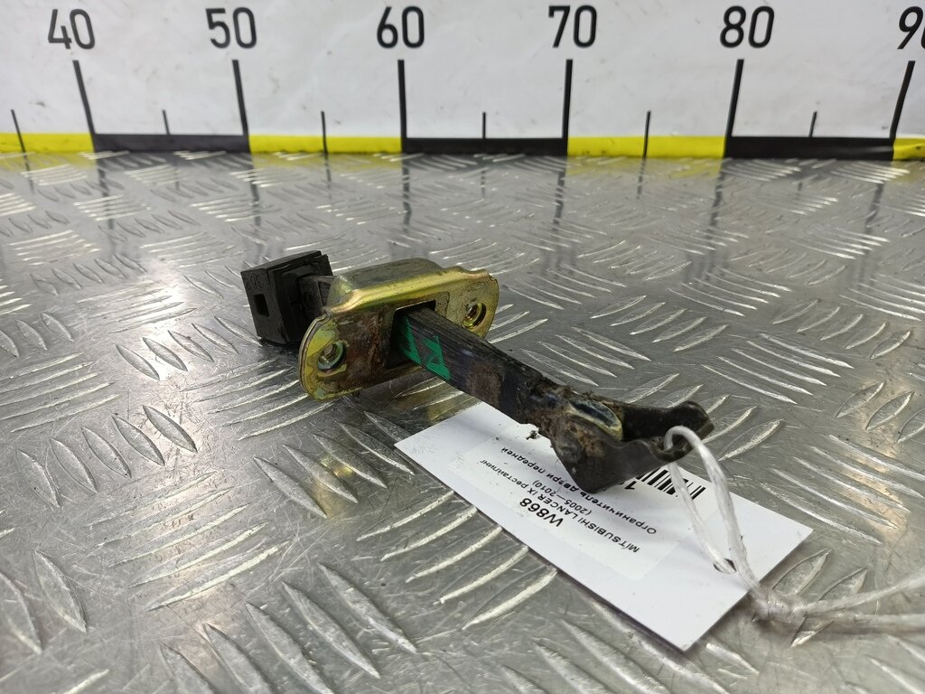 Ограничитель двери передней Б/У для MITSUBISHI LANCER IX рестайлинг (2005—2010) MR526777