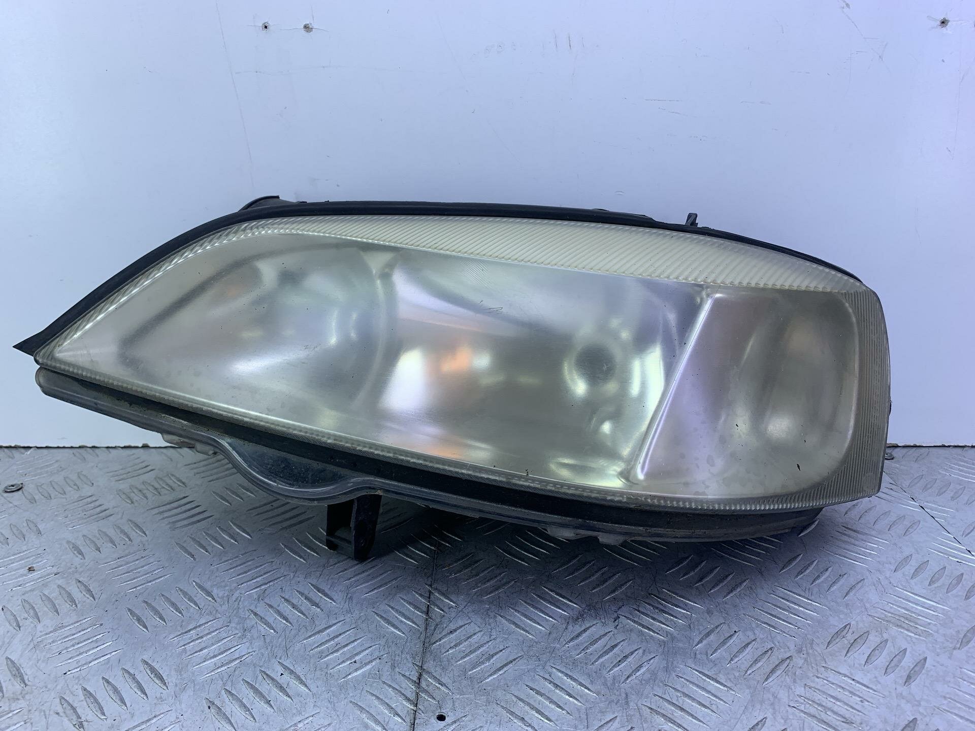 Фара левая Opel Astra G 1999 90520877