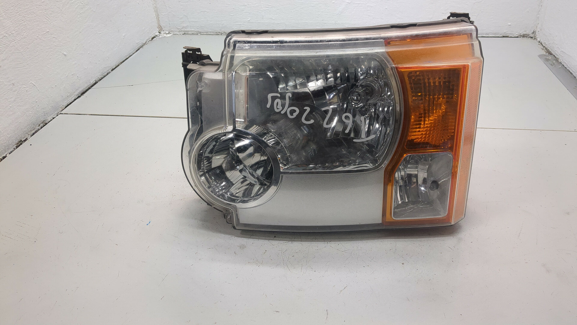 Фара (передняя) левая Land Rover Discovery 3 Б/У