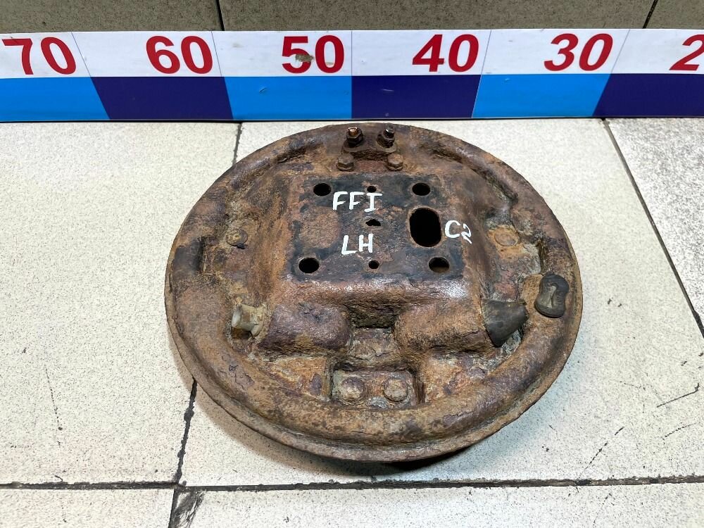 Щит опорный задний левый Ford Focus I YS4Z2212CA