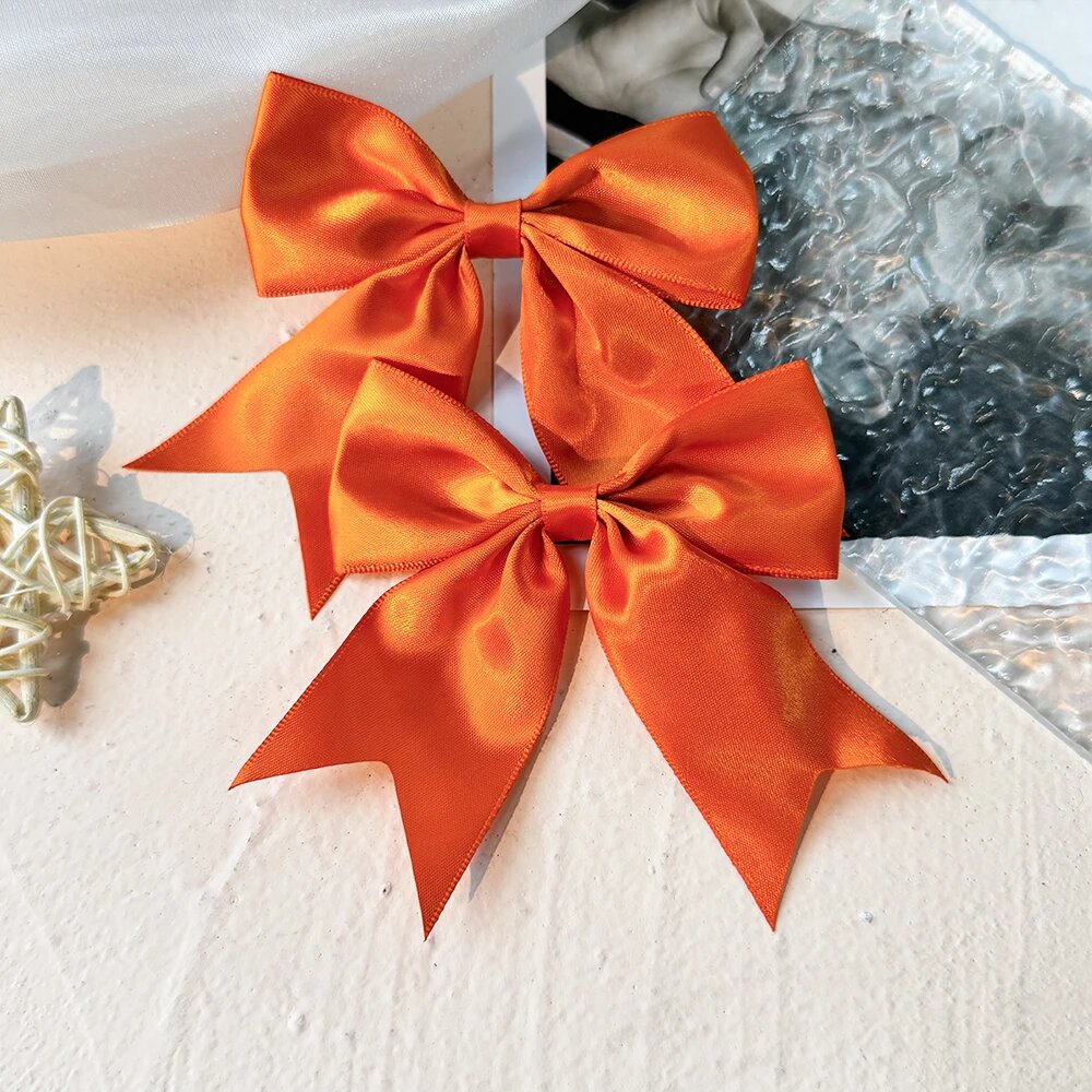 Оранжевые заколки CUTE BOWS DLD-0751x2