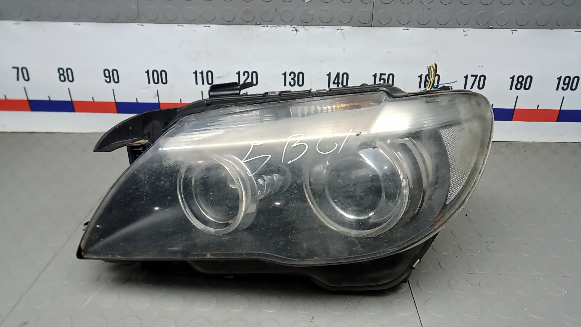 Фара левая BMW 7 E65