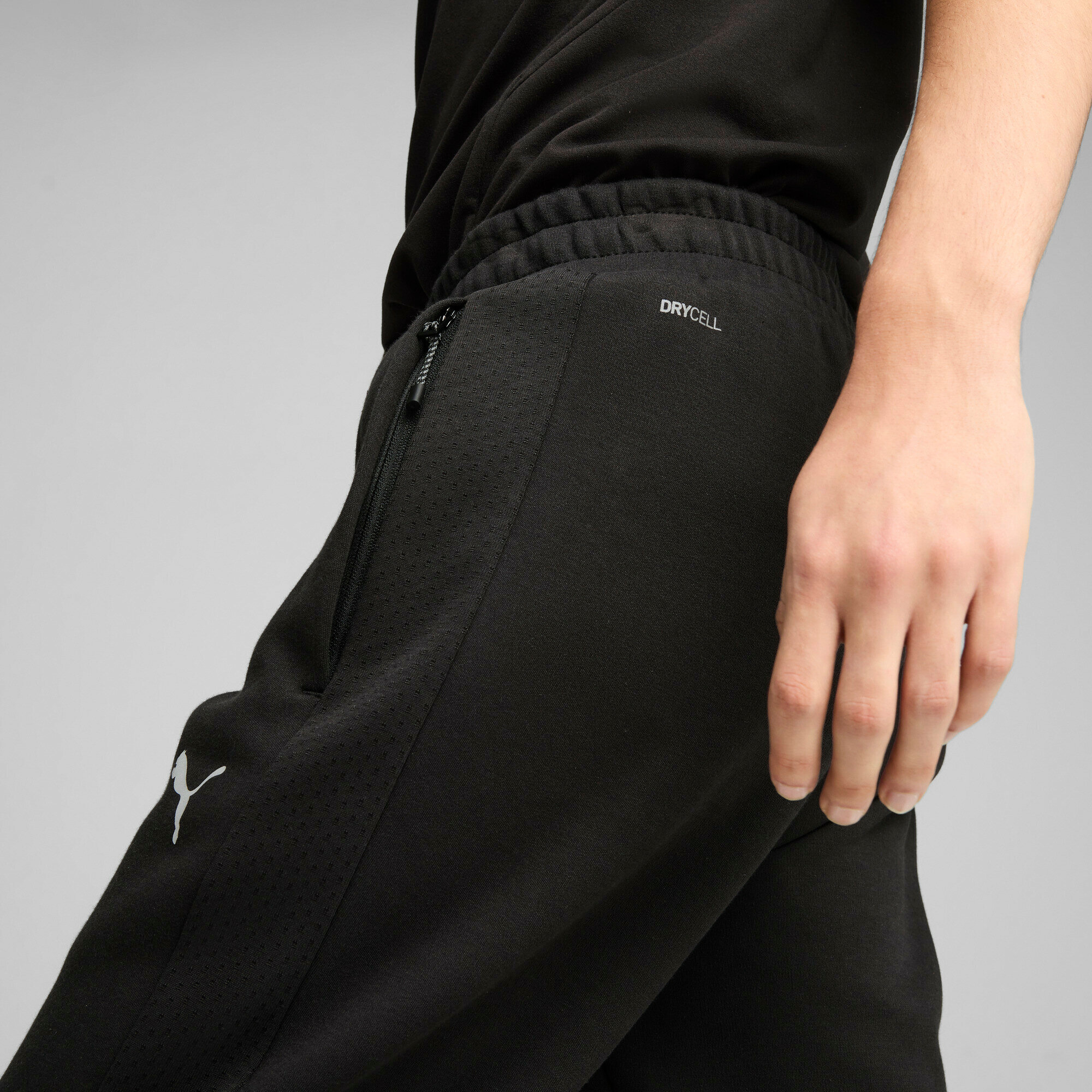 Брюки PUMA EVOSTRIPE Pants, размер M, черный — фото 1