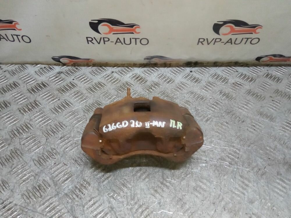 Суппорт передний правый Mazda 626 GD 2.0 1987—1996