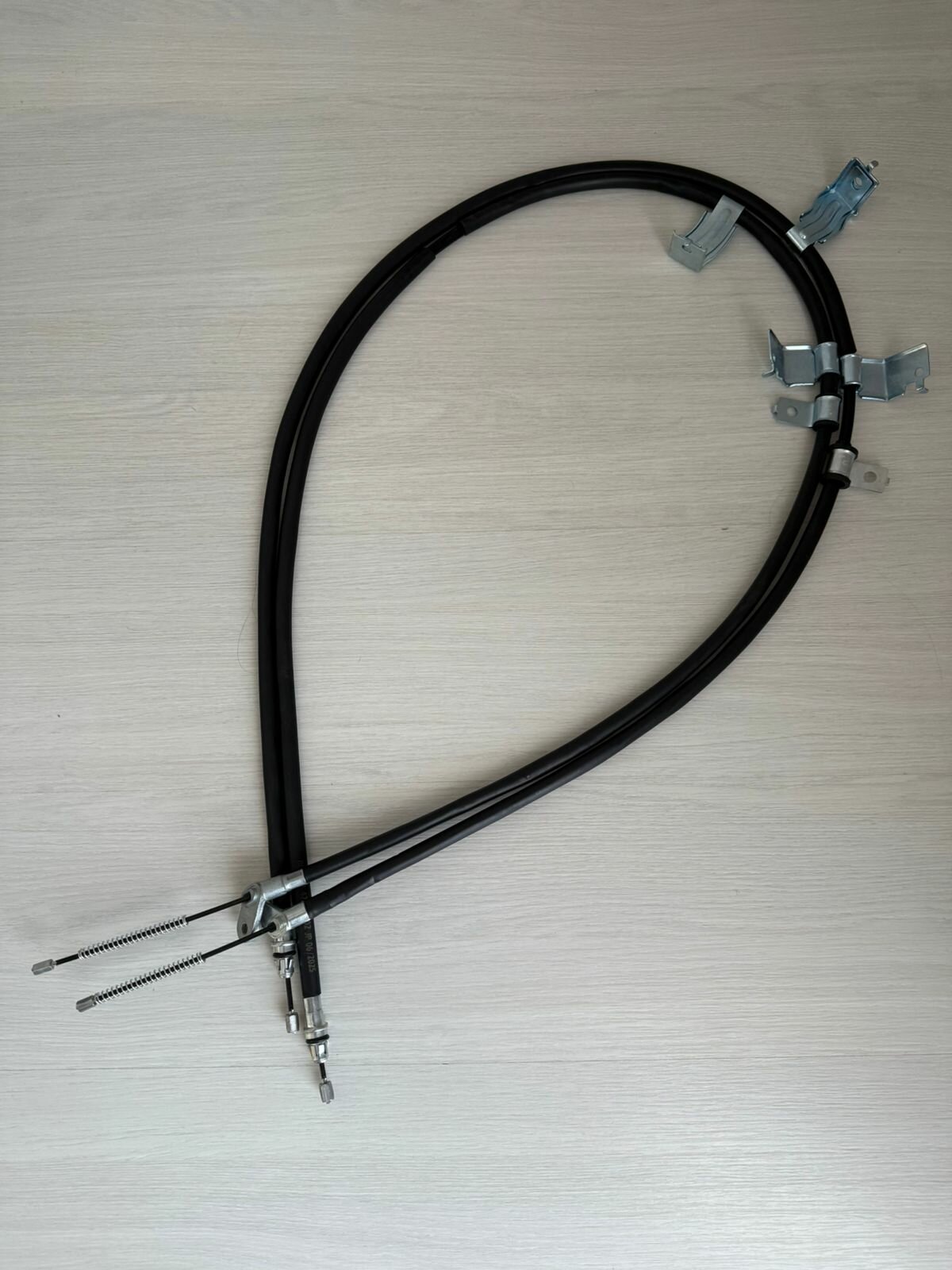 Трос ручника комплект левый+правый Nissan Qashqai+2 Ниссан Кашкай+2 (JJ10E)