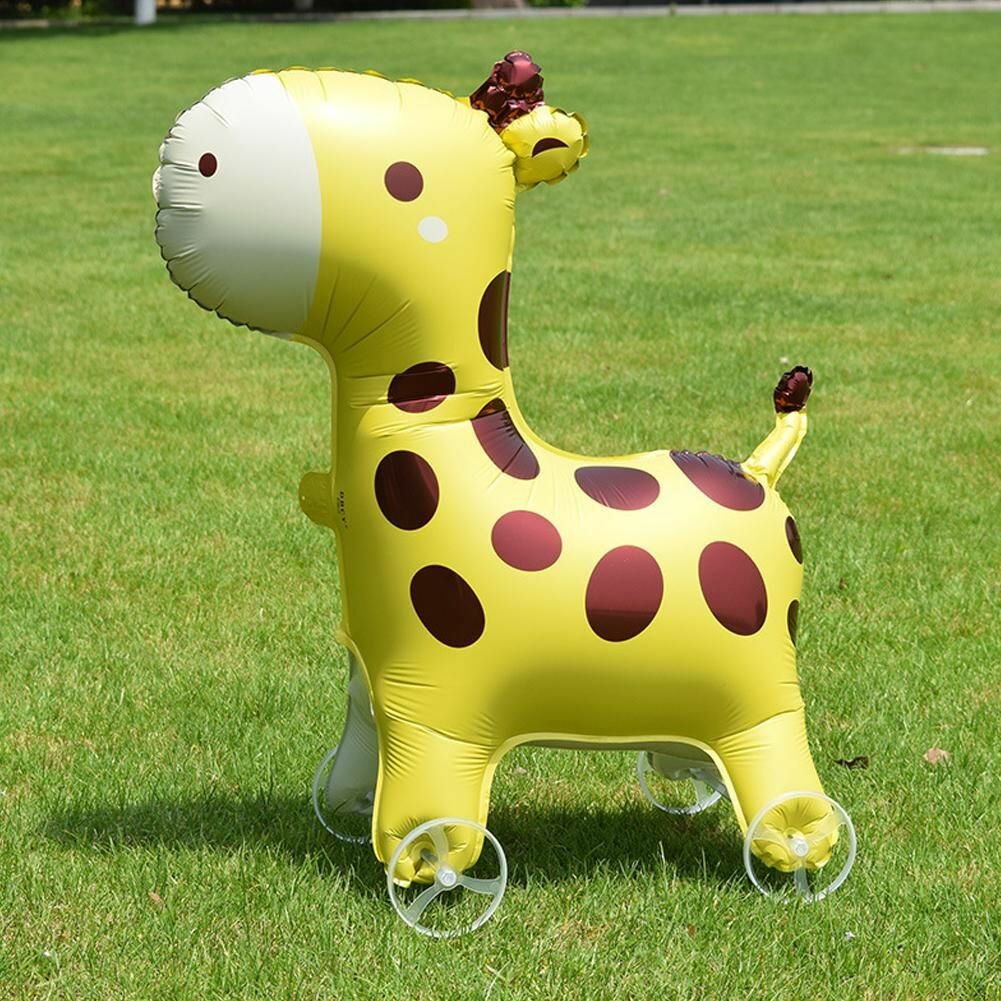 Детский день рождения, воздушный шар в виде мультяшного ходячего животного на колесах.