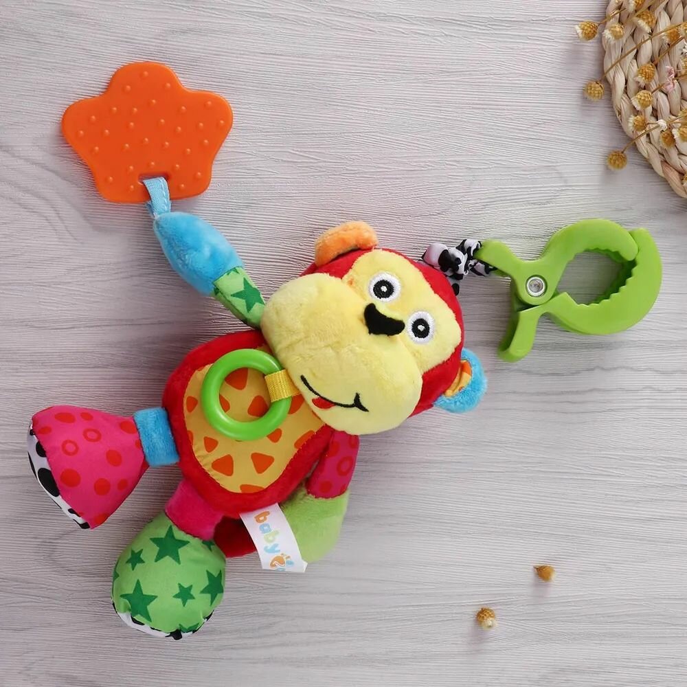 Музыкальная игрушка Мартышка с вибрацией для стимуляции органов чувств у ребёнка