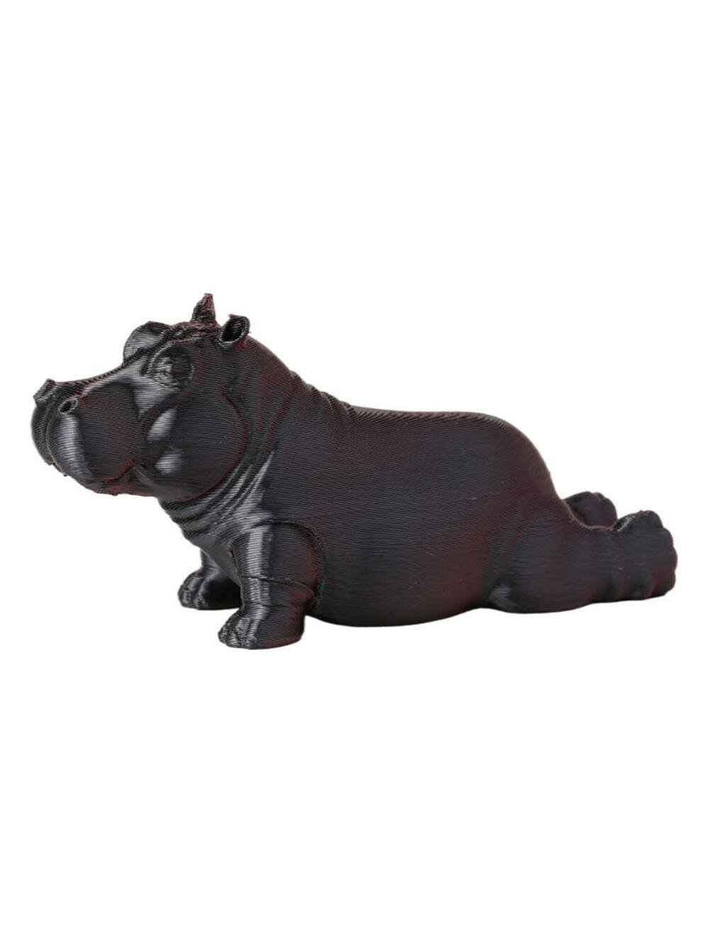 Симпатичная декоративная статуэтка бегемота