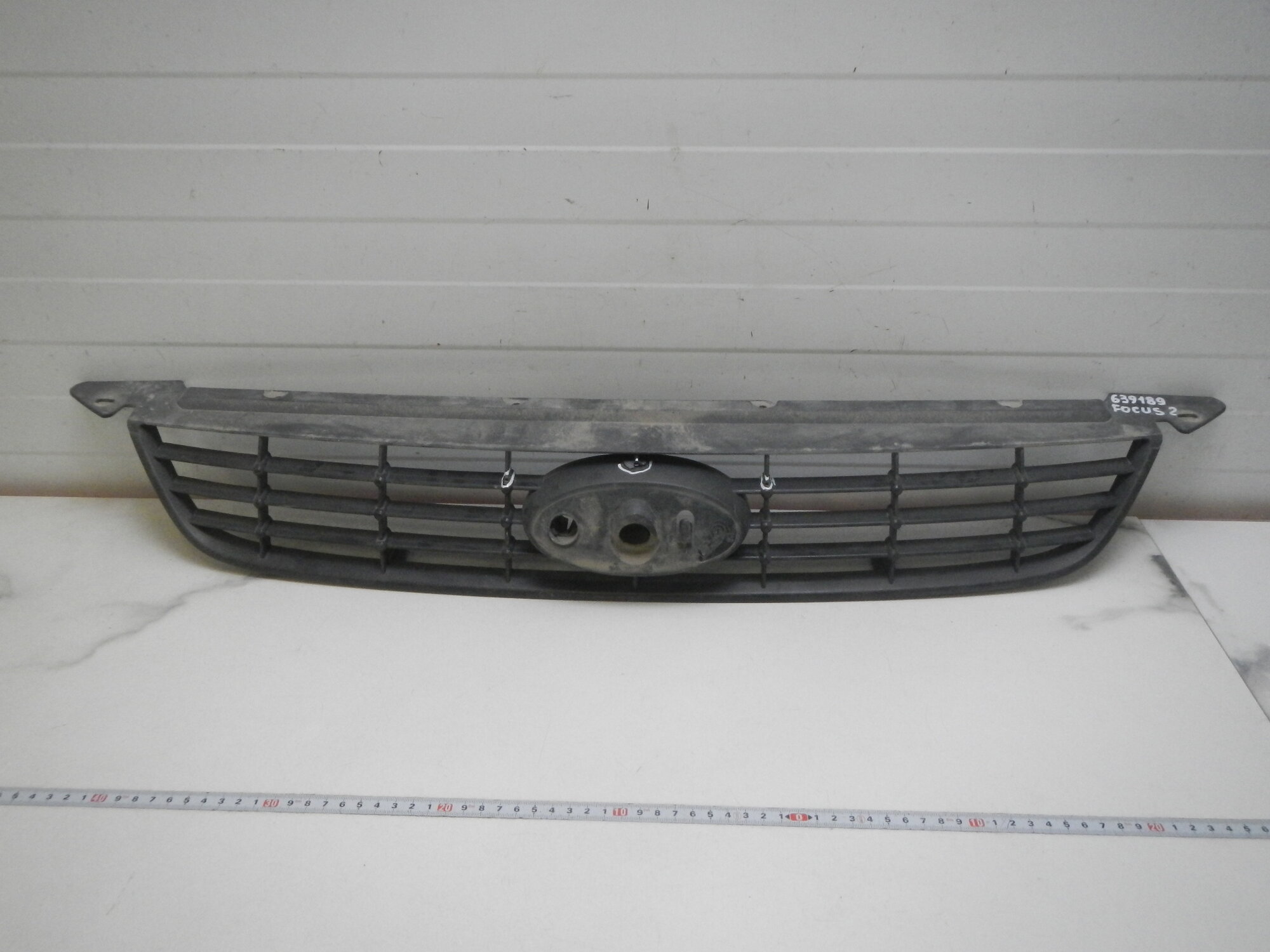 Б/У Решетка радиатора, Ford (Форд)-FOCUS 2 (08-11) FORD FOCUS 2 (08-11) Трещины, царапины. 639189 FORD арт. 8M518200BE