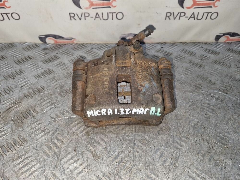 Суппорт передний левый Nissan Micra K11 (59060)