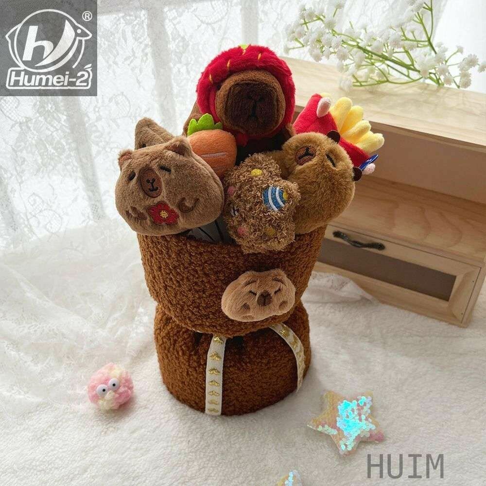 Мягкая игрушка с цветами/Букет из плюшевых игрушек "Капибала"