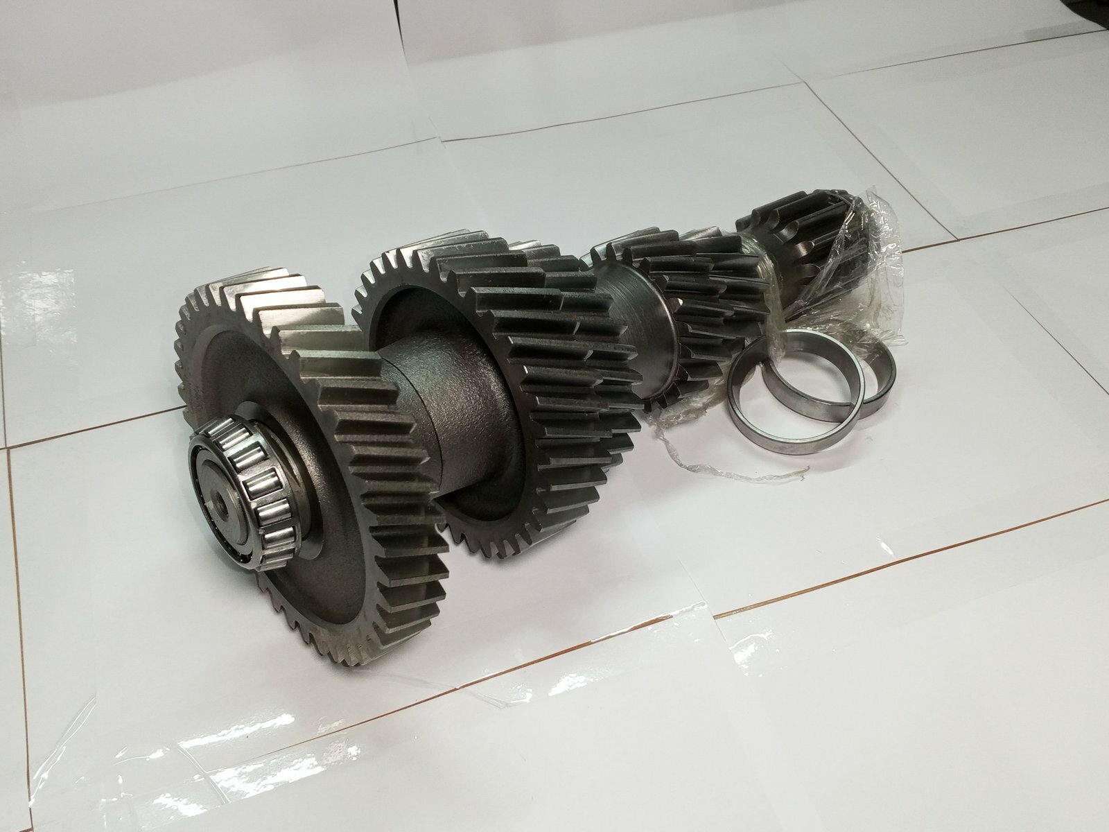 Вал промежуточный КПП ГАЗон NEXT 5-ст. в сб. с подшипниками ГАЗ (шестерня 4-ой передачи толщ.36мм)