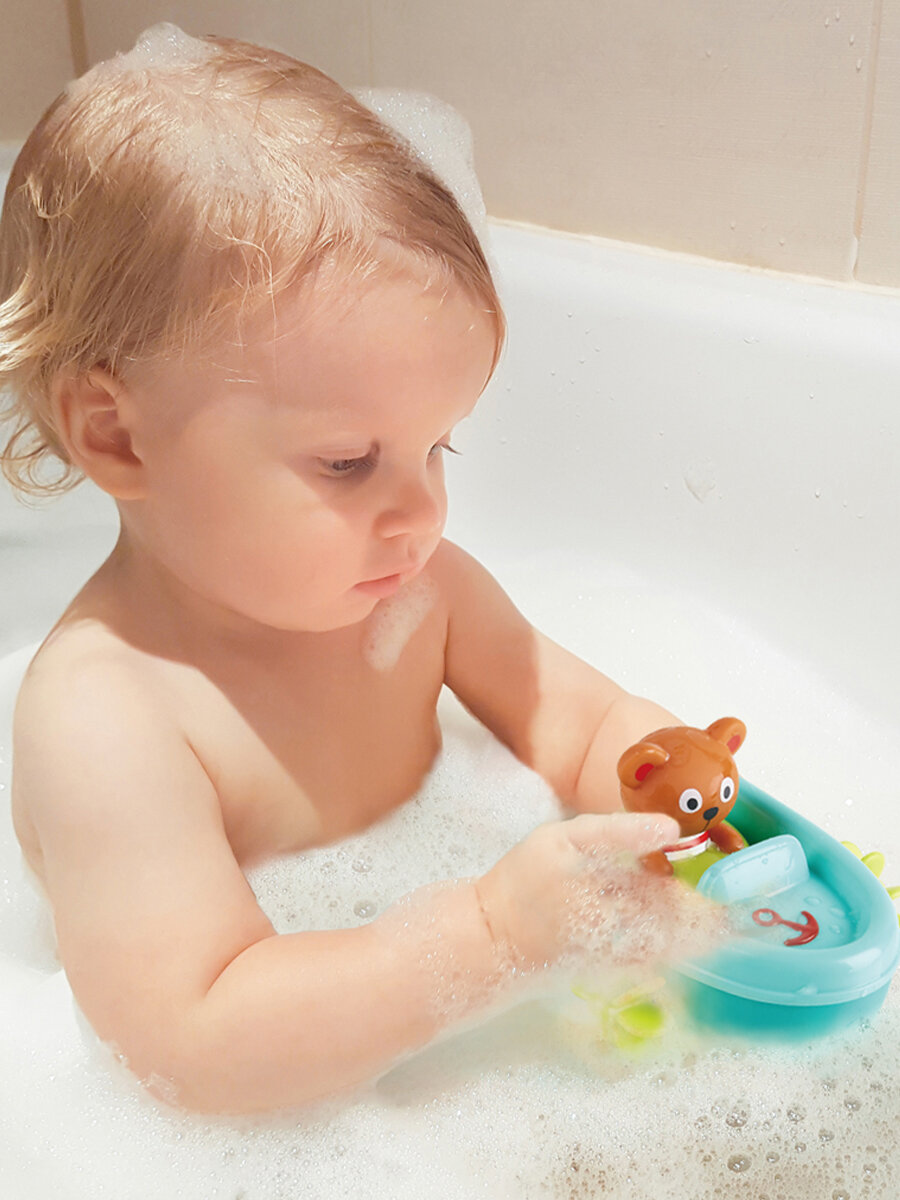 Заводная игрушка для купания Hape "Мишка на тюбинге", E0217_HP