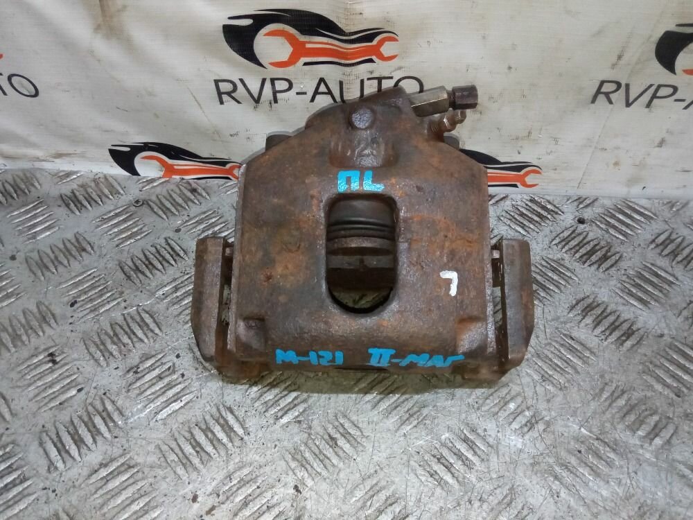 Суппорт передний левый Mazda 121 1996—2003 1478495