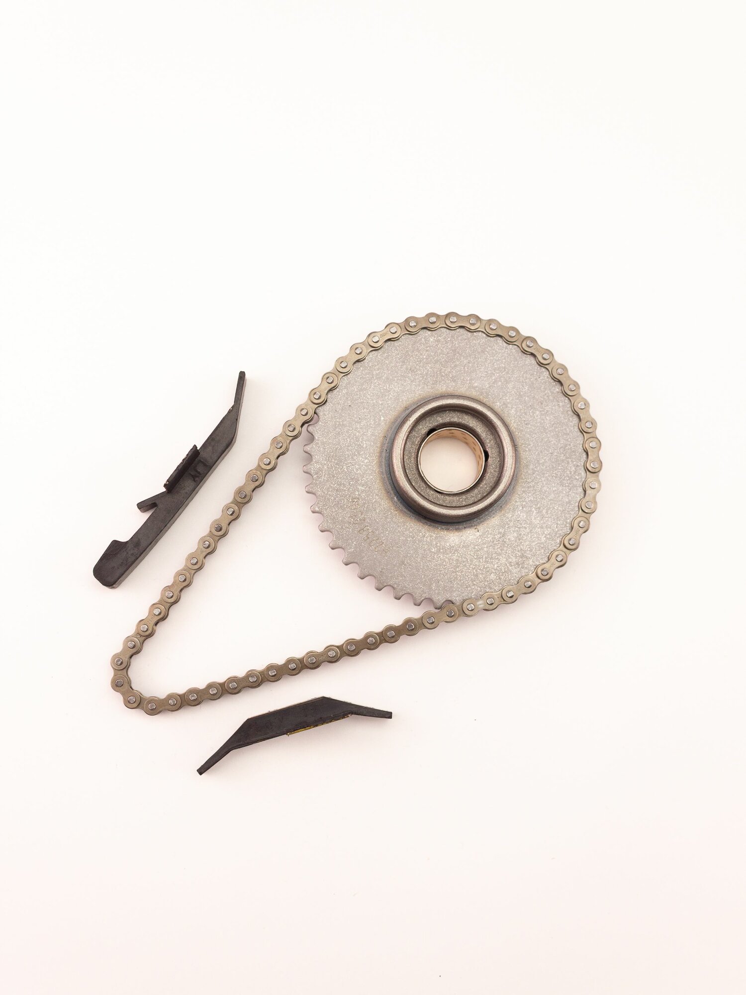 Шестерня (ремкомплект) обгонной муфты электростартера YX 50-125 c цепью и слайдерами для питбайка