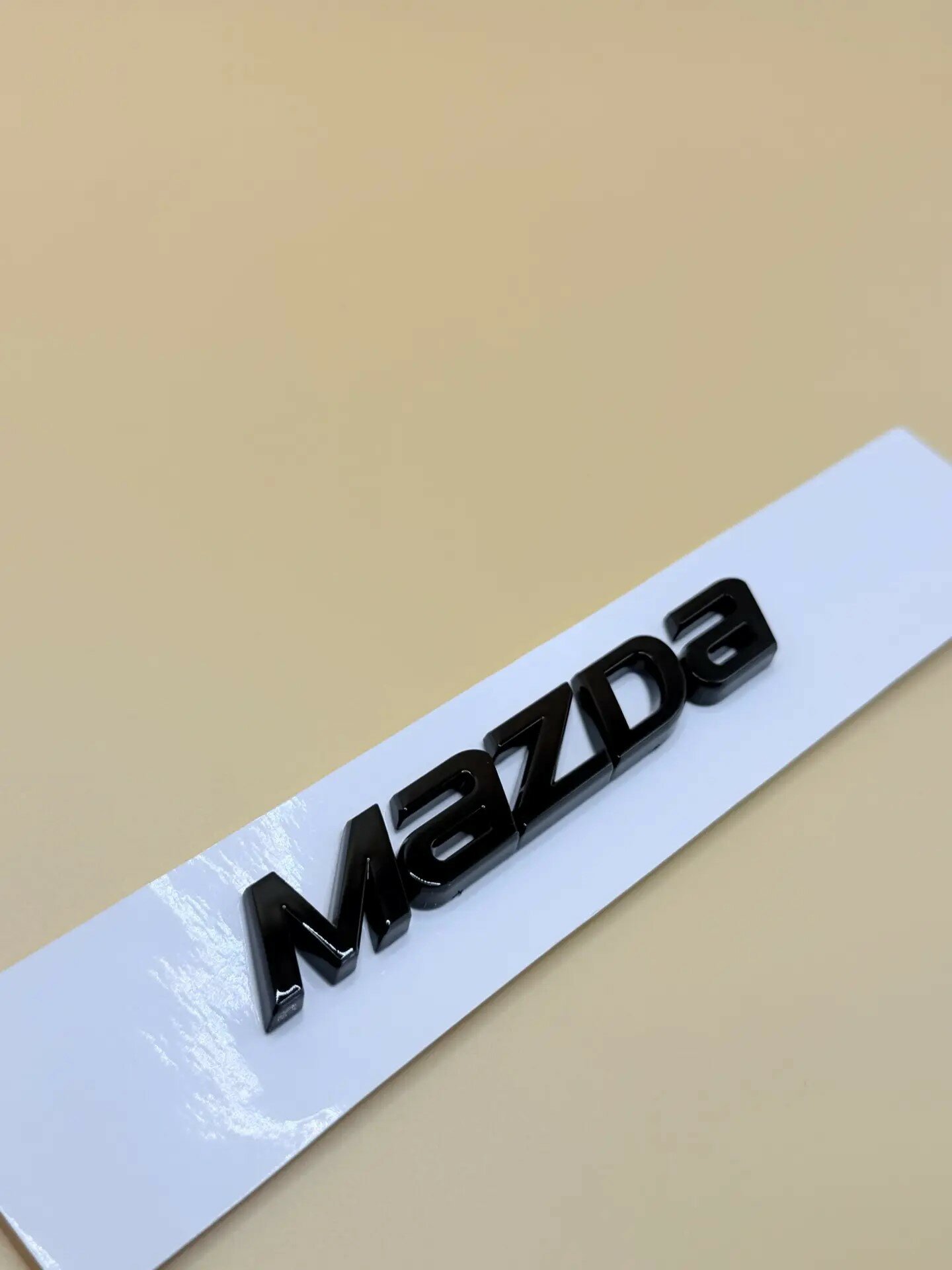 Шильдик Наклейка на багажник Mazda Мазда 12см Черный глянец