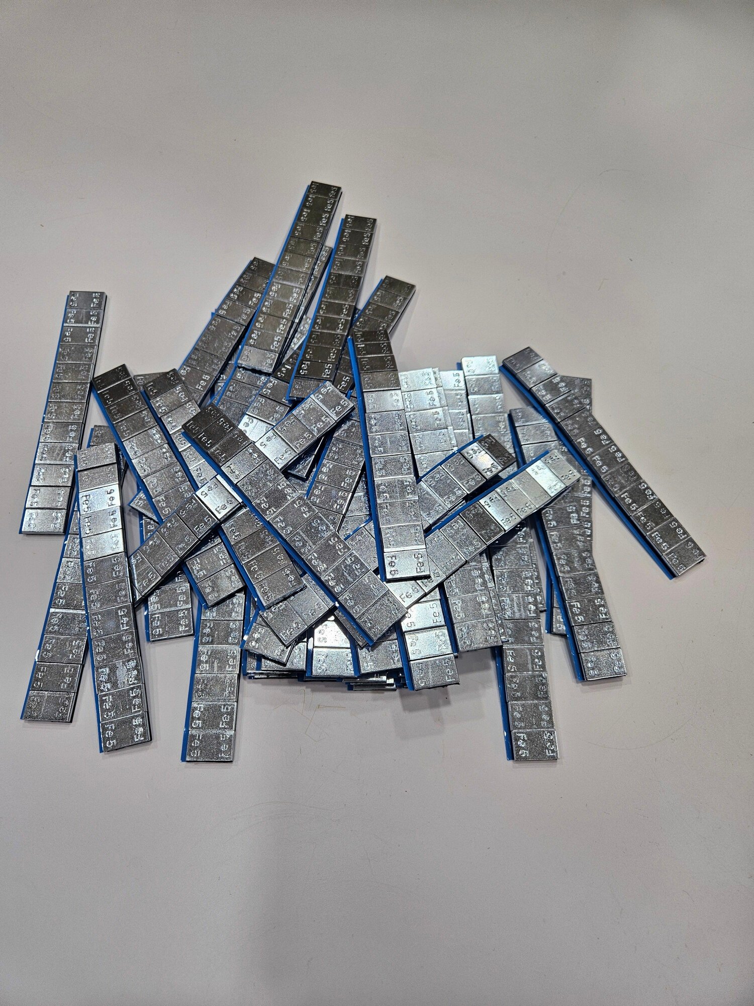 Грузики для балансировки колес самоклеющиеся стальные оцинкованные NORDBERG , 12*5гр, 50 лент