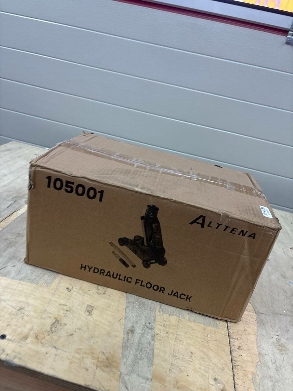 Домкрат подкатной гидравлический ALTTENA 105001 2.5т, высота подъема 390 мм уцененный