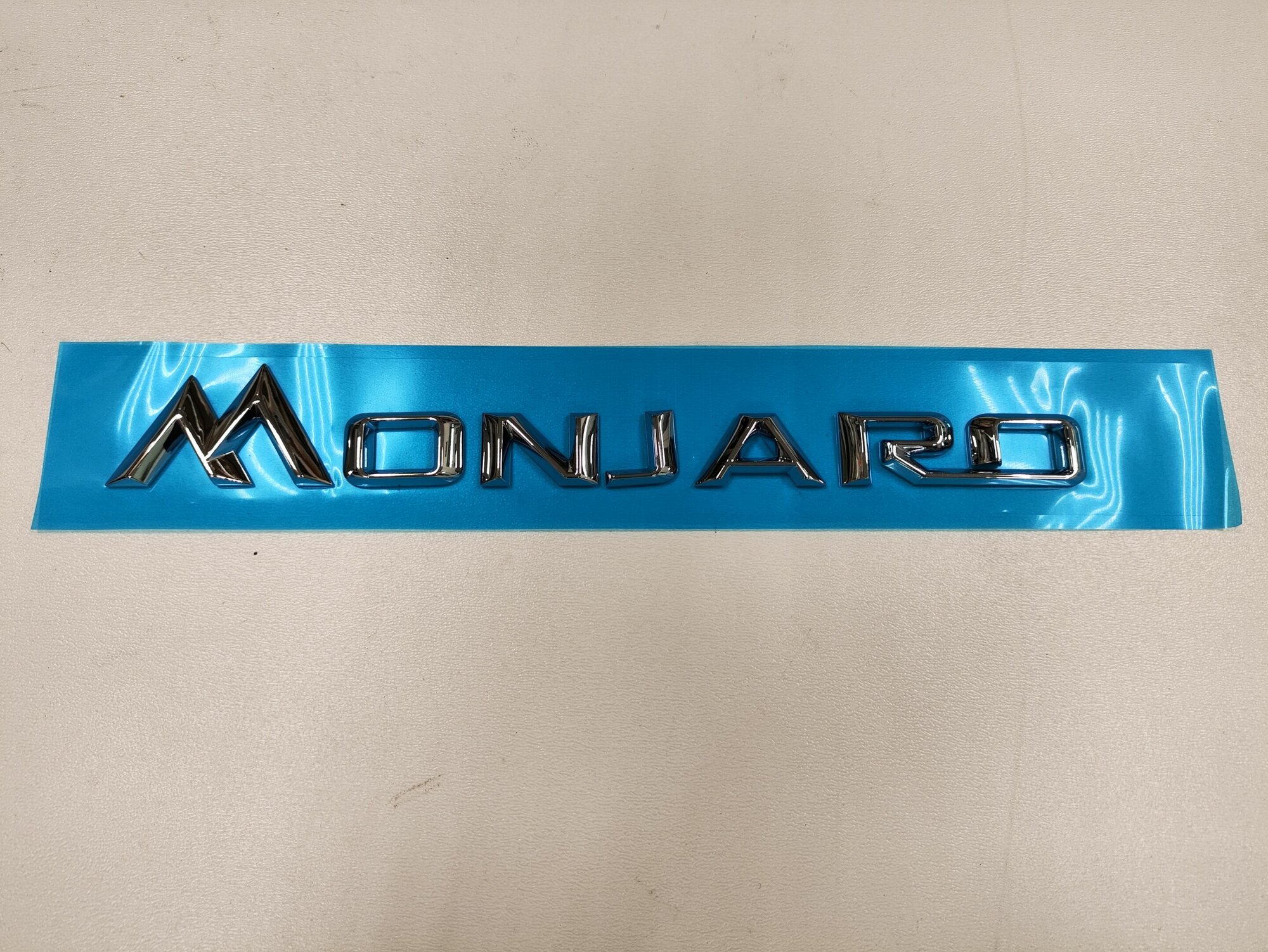 Эмблема "Monjaro" Geely Monjaro [2.0 16V 8AT внедорожник 4X4 Turbo] 9015028900