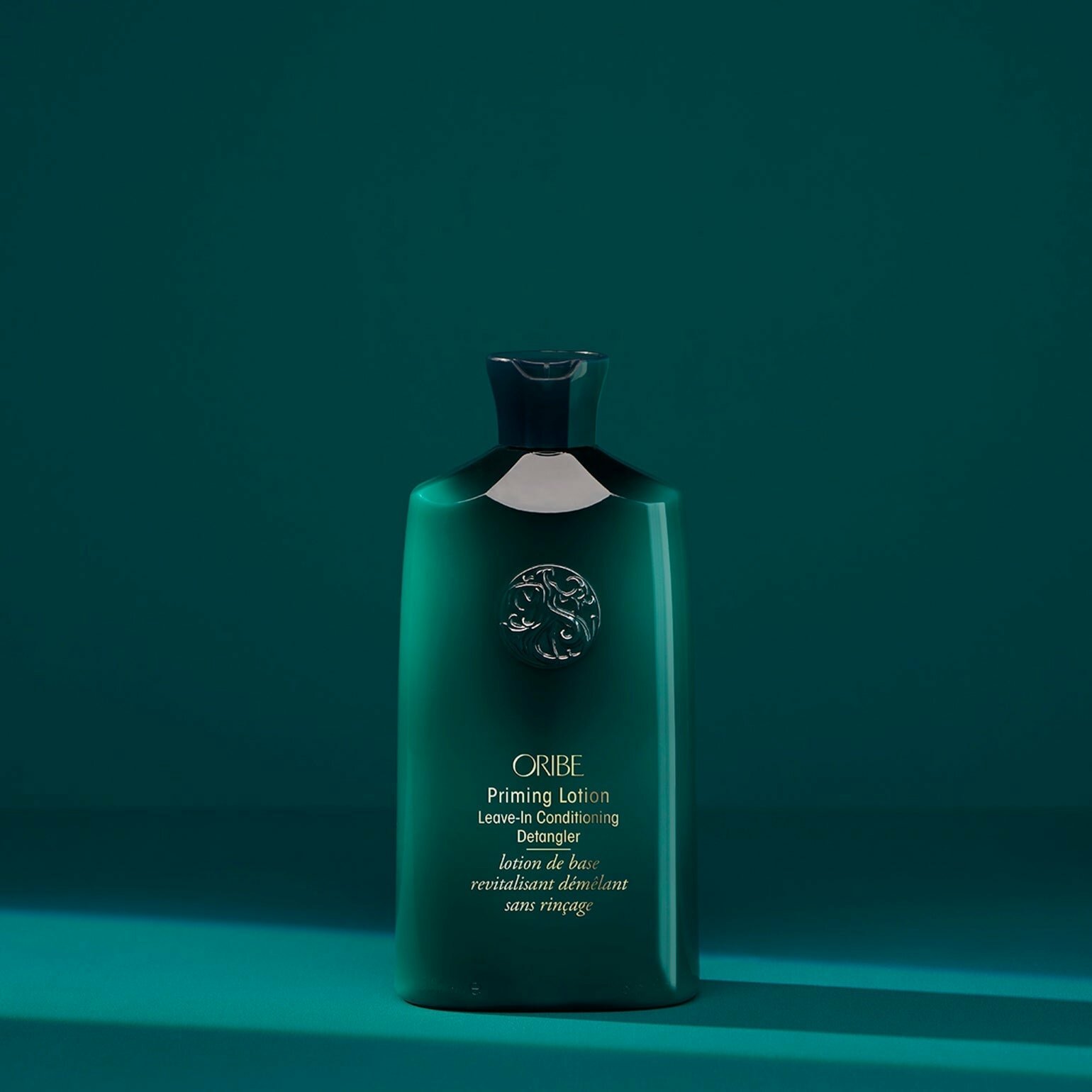 ORIBE Термозащитный, питательный бальзам, облегчающий расчесывание сухих волос без смывания. Priming Lotion Leave-In Conditioning Detangler 250 мл