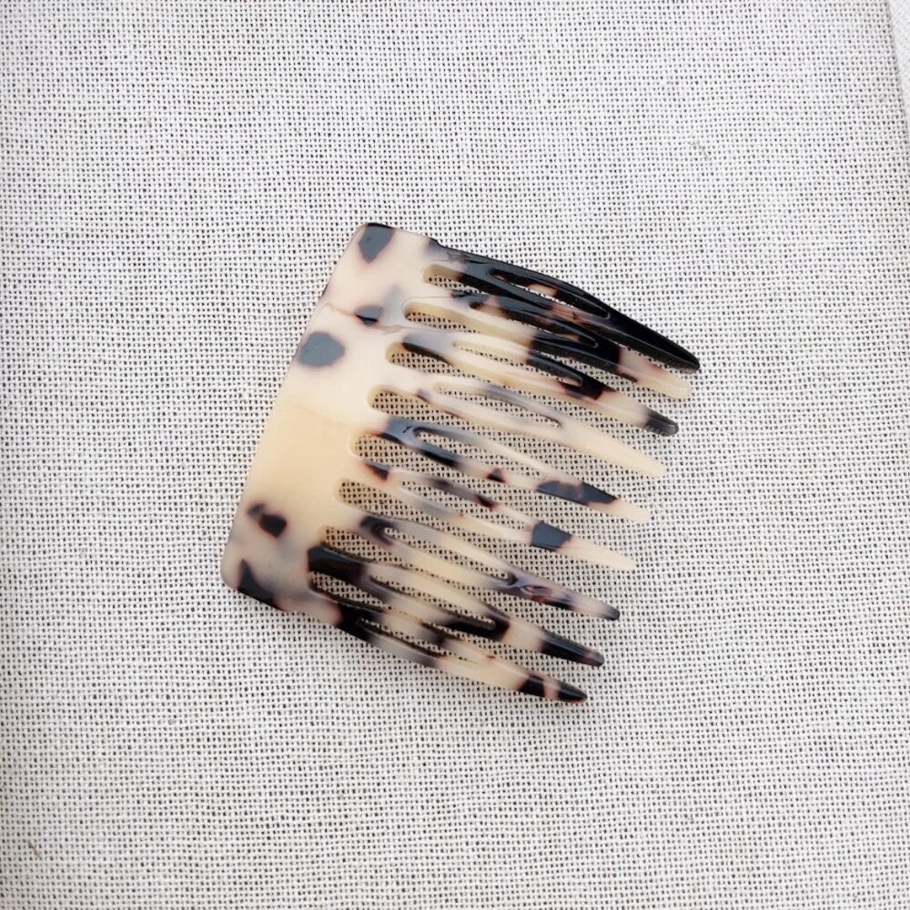 Французская боковая расческа пластиковая черная A