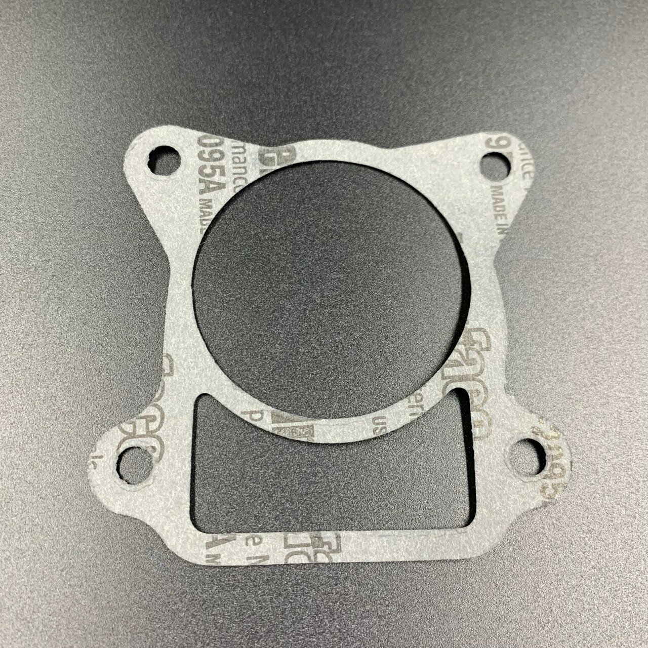 Прокладка под основание помпы охлаждение Honda BF20-50 (Omax)
