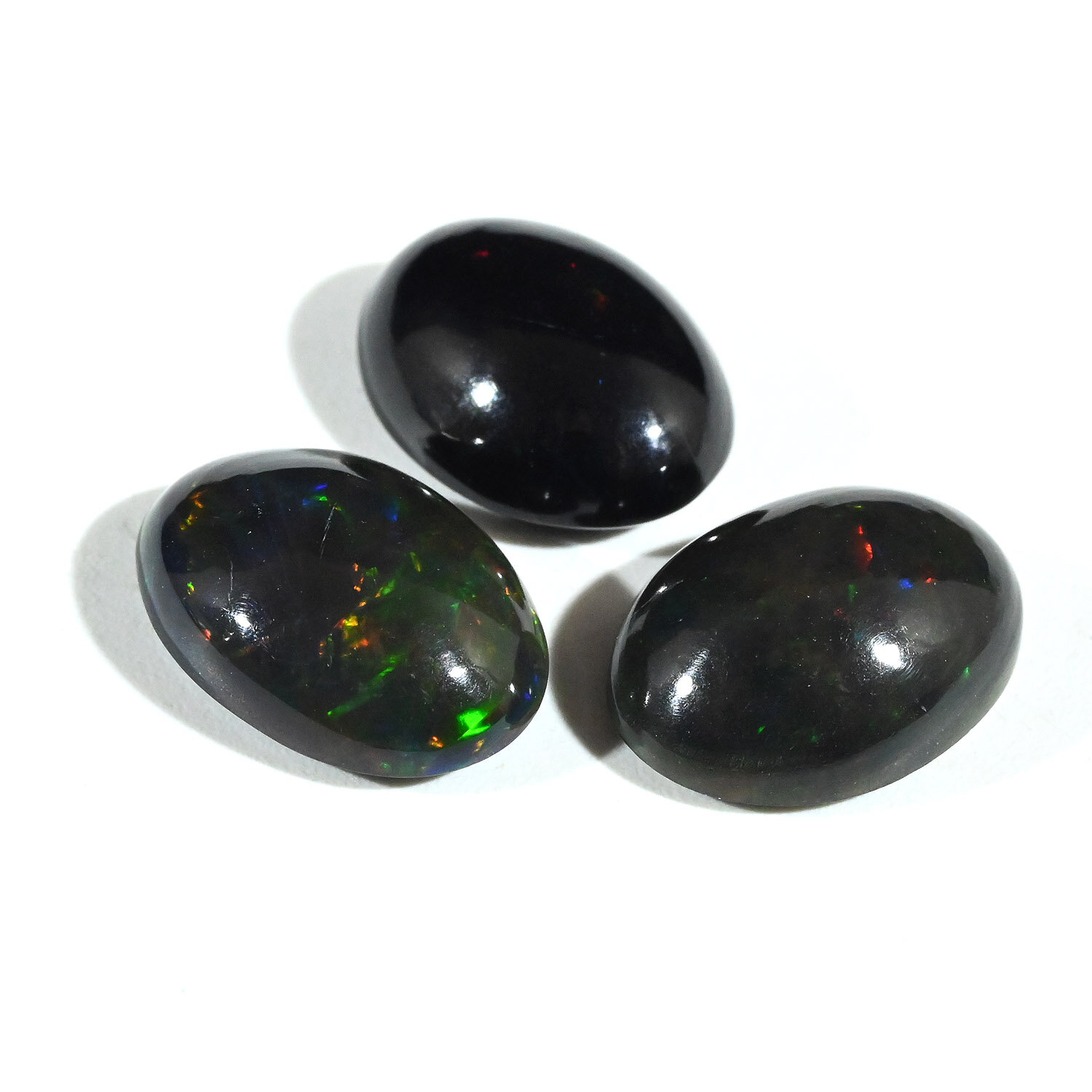 Кабошон из опала черного овал 10*13мм