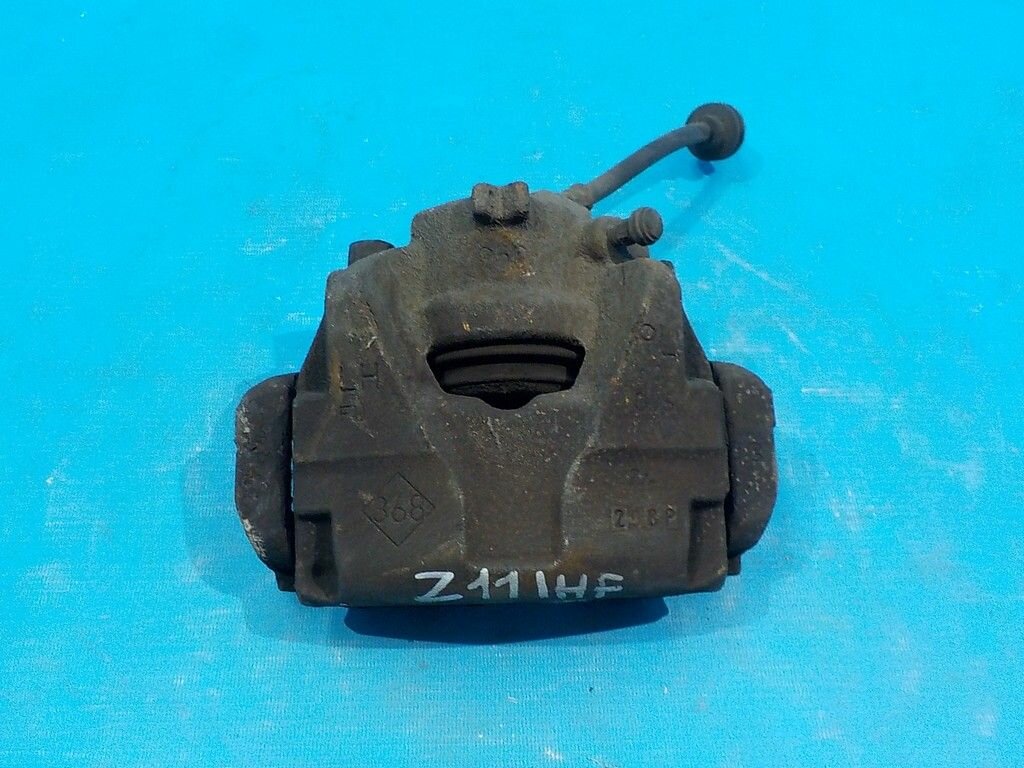 Тормозной суппорт передний левый RENAULT Duster 1 2010-2019 410111495R - Б/У