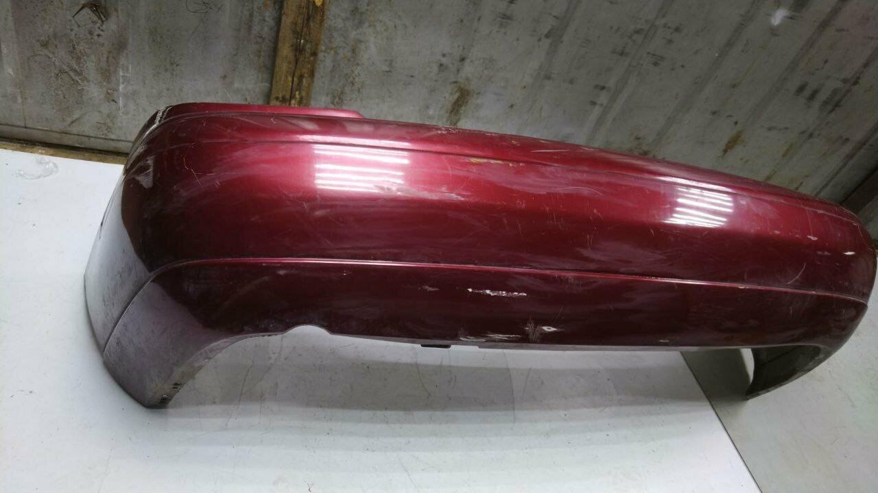 Бампер задний Ford Focus (1998 - 2001) YS4X17D781DG