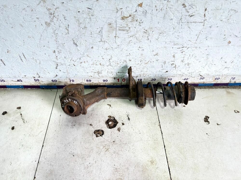 Стойка амортизатора переднего правого Opel Astra F