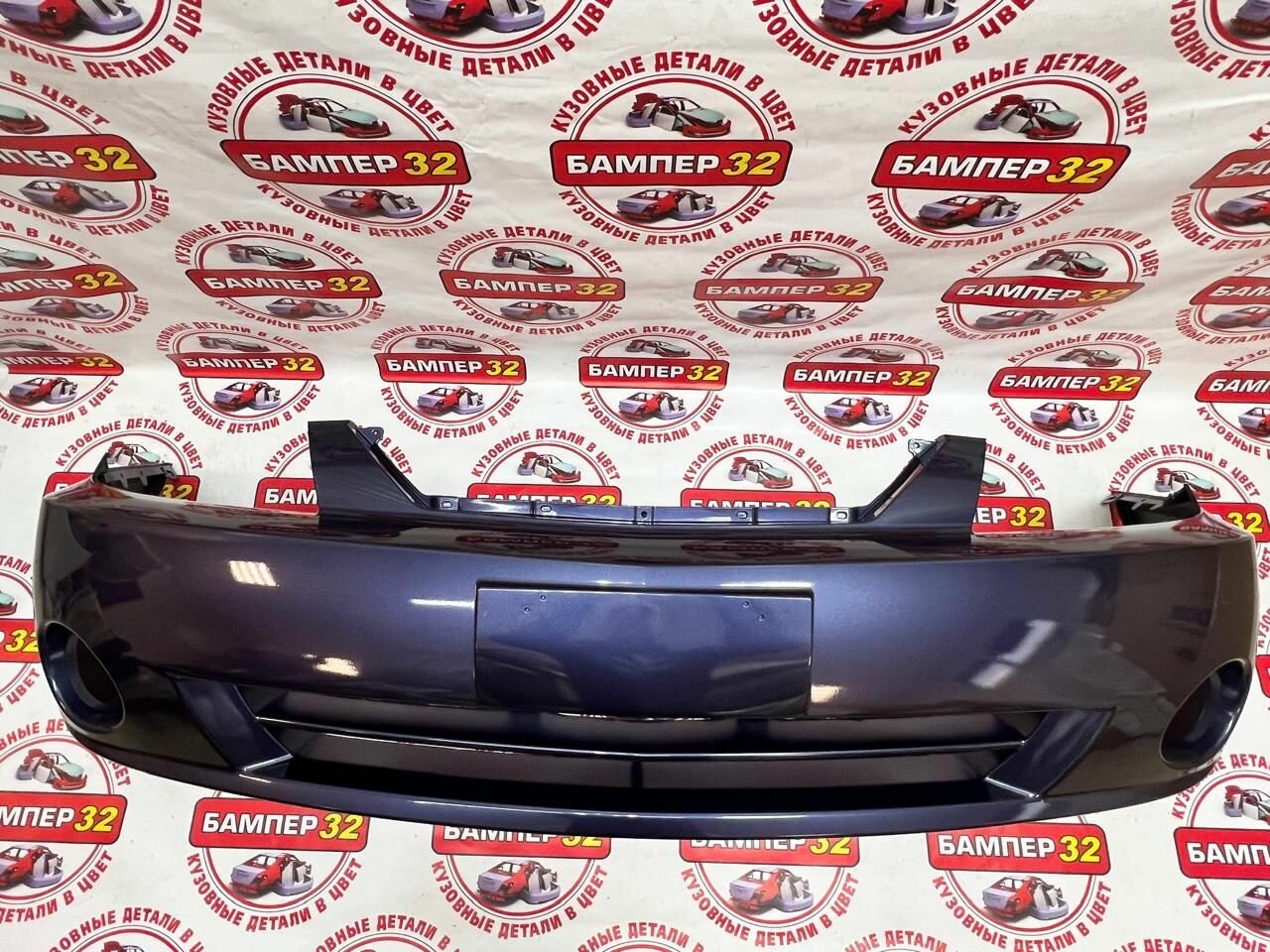 Бампер передний Киа Спектра, цвет мерцающий синий 6B