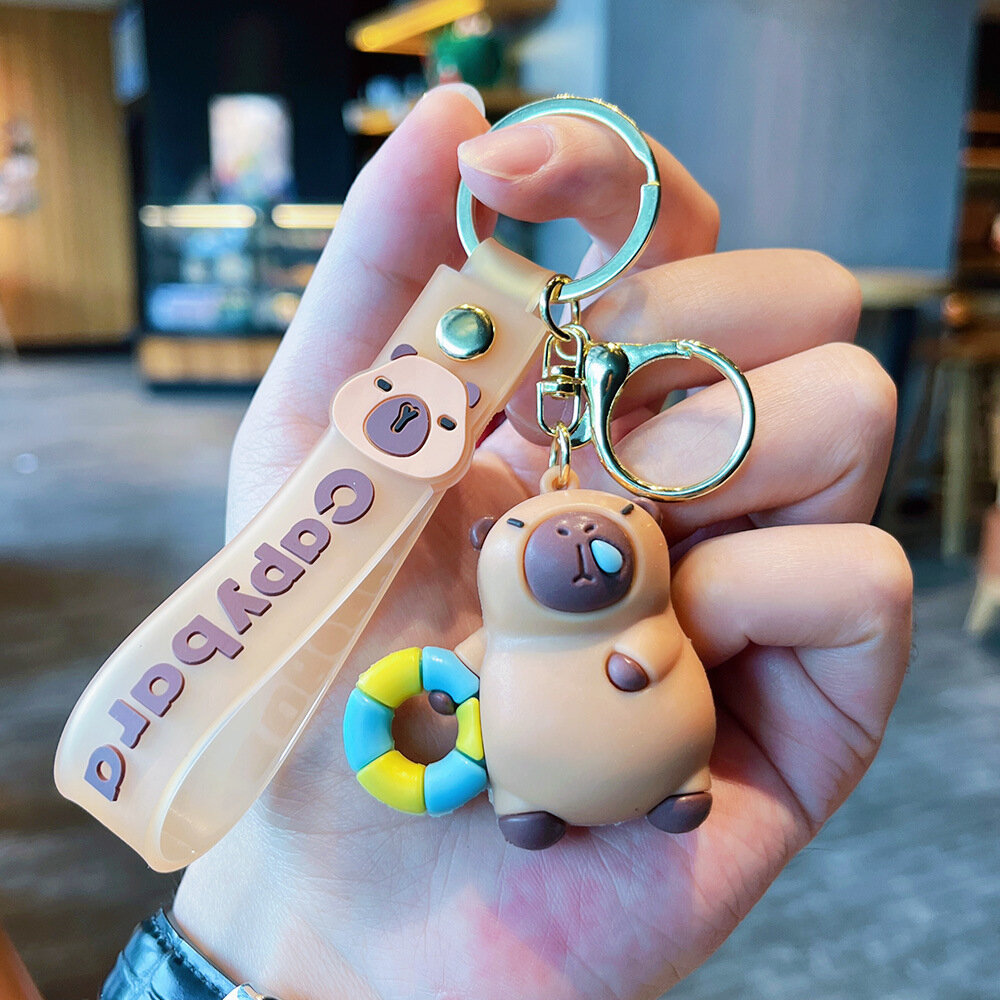 Брелок-подвеска в виде мультяшной капибары, креативное милое украшение для автомобиля в виде пары кукол, подвеска с капибарой, ручной плавательный круг.