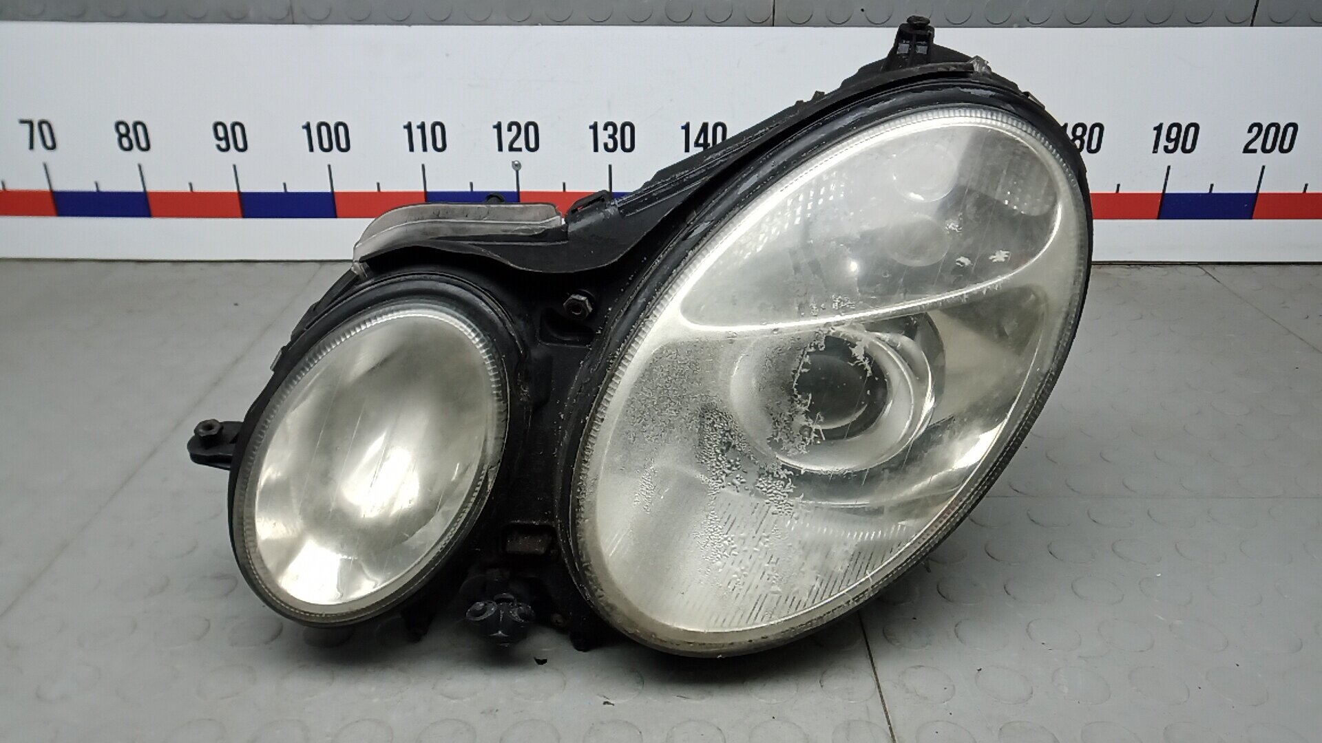 Фара левая MERCEDES BENZ E-CLASS W211