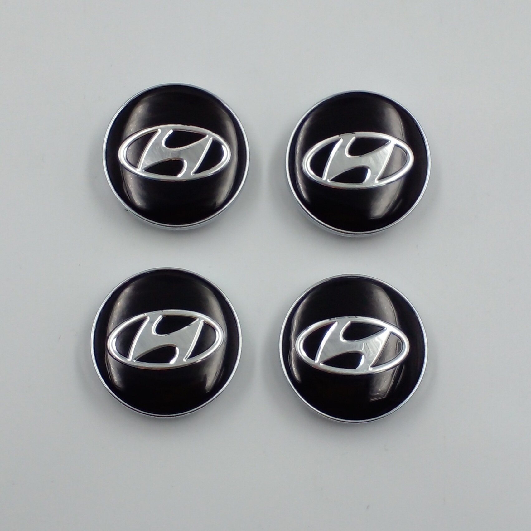 Колпачки заглушки на литые диски с эмблемой 60 мм 4 шт