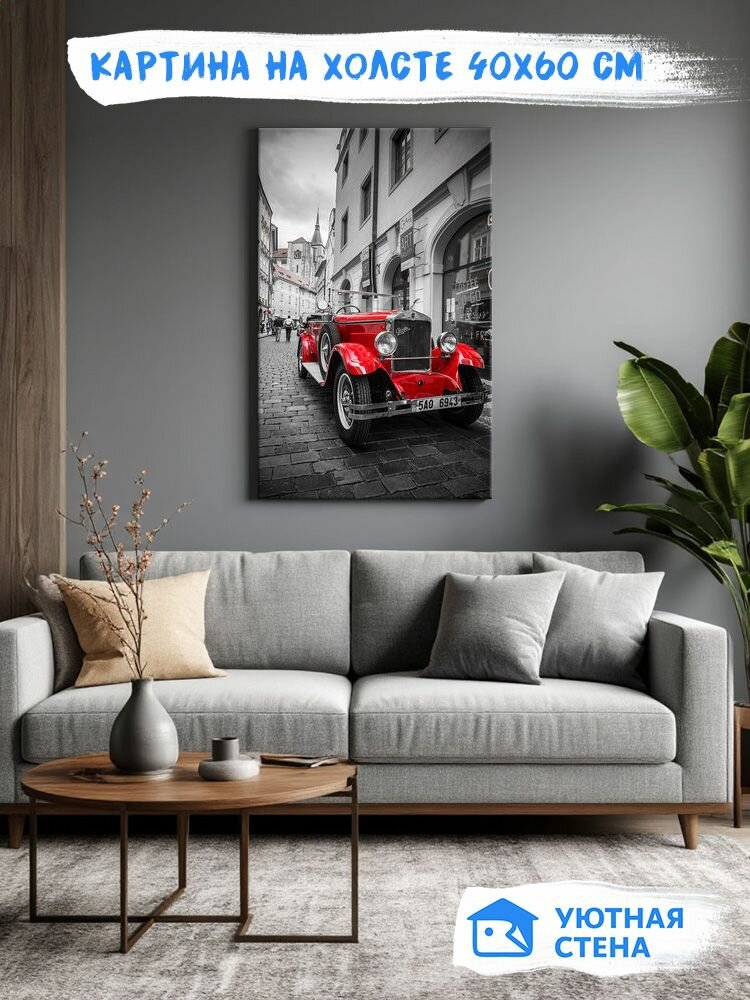 Картина на натуральном холсте Уютная стена "Красный ретро автомобиль на фоне черно-белой Праги" 40х60 см
