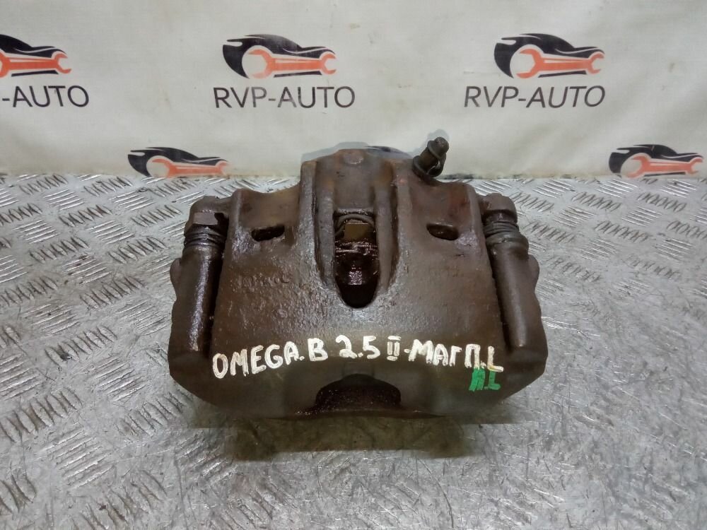 Суппорт передний левый Opel Omega B Opel