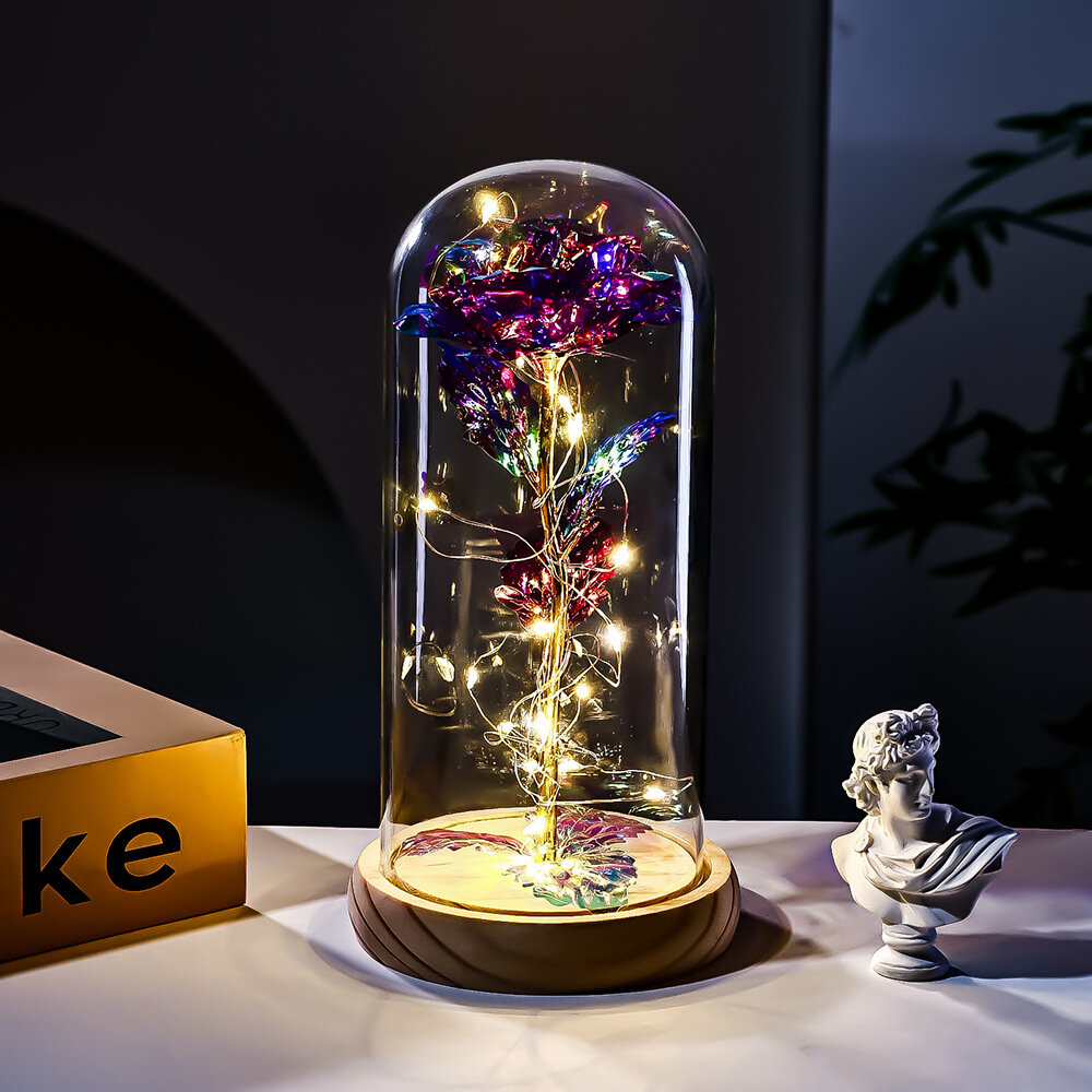 Ночник "цветет вечно" в колбе на батарейках - это готовый подарок для девушки в защитном чехле.