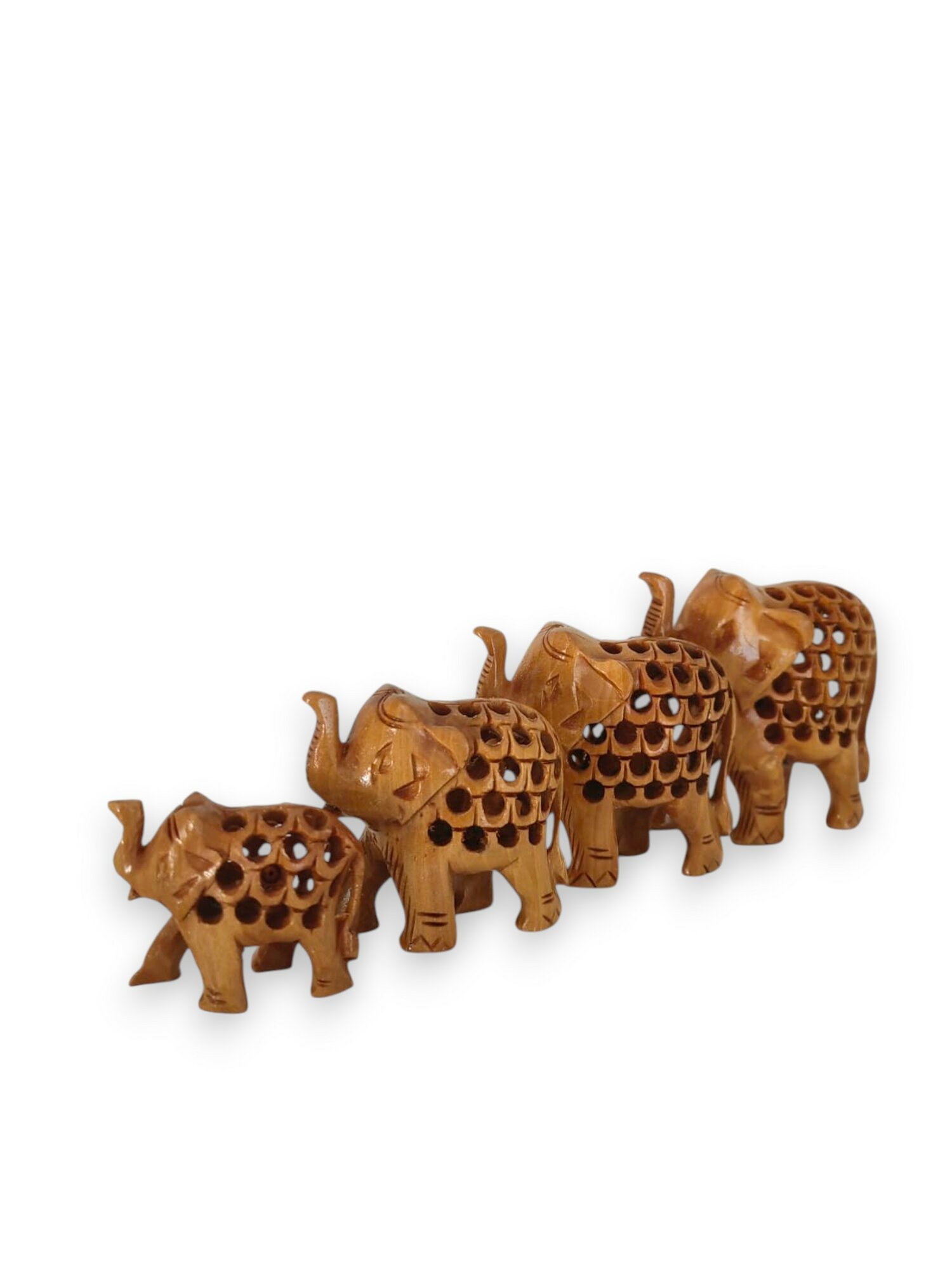 Набор четыре деревянных резных слоника с хоботами вверх и слониками внутри (8 - 6,5 - 5,5 и 4 см.)