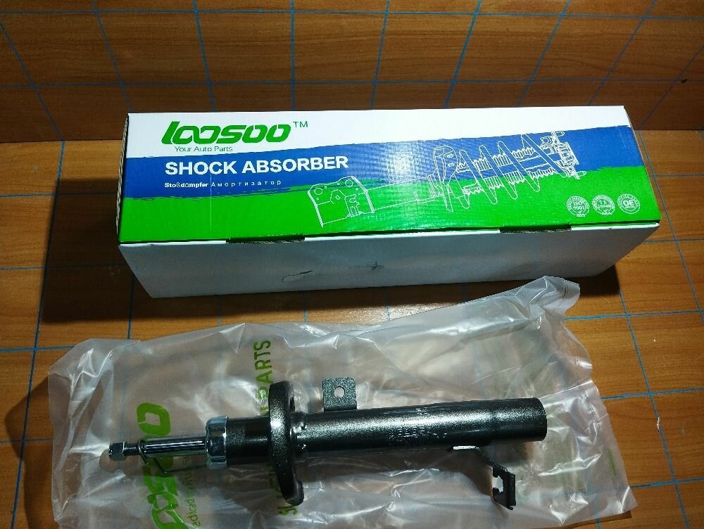 Стойка амортизатора передняя левая Ford Fiesta 5