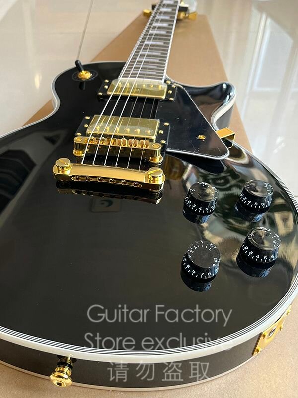 Электрогитара Gibson Les Paul с 6 струнами, длина корпуса 39 дюймов.