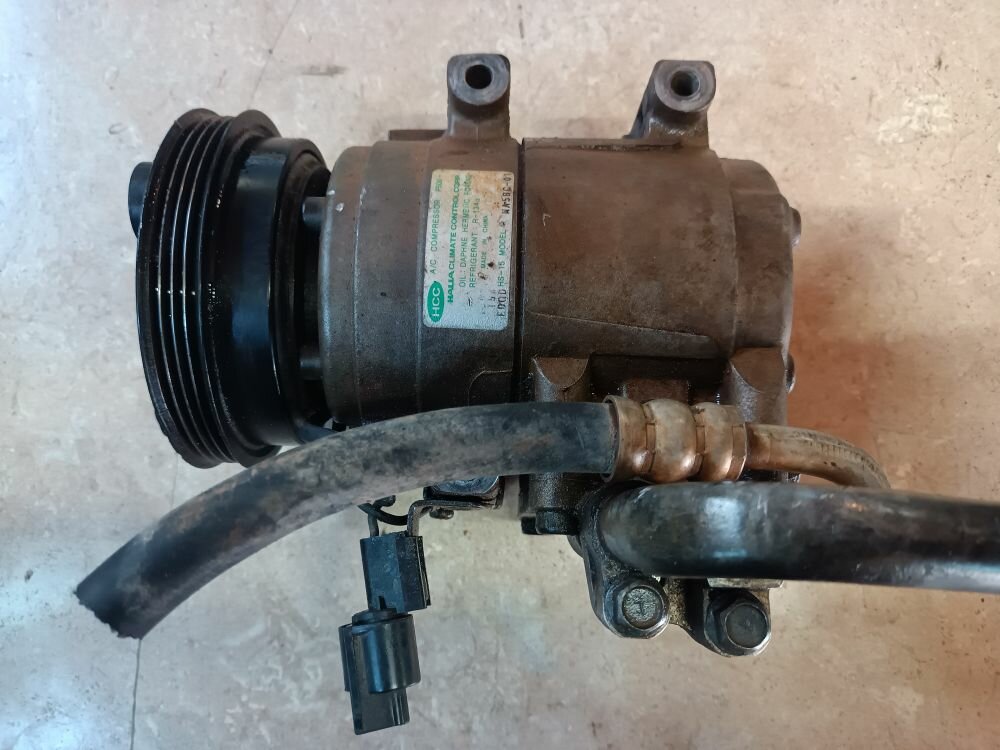 Компрессор конд-ра Хундай Туксан Hyundai Tucson 977012D700